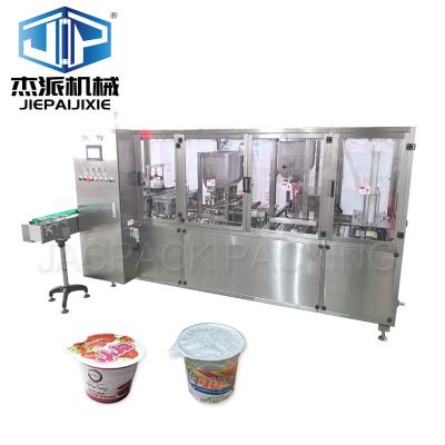 China Touch Screen Operation System Plastic Cup Filling Sealing Machine with ±1% Filling Error for sale