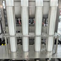 China Touch Screen Operation System Plastic Cup Filling Sealing Machine with ±1% Filling Error for sale