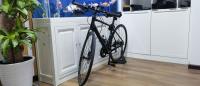 China Versatile Bicycle Floor Type Hub Mount Parking Rack Stand for Mountain and Road Bikes for sale