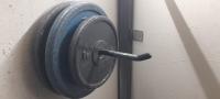 China Wall Tyre Holders with Metal Screws and Dowels Retaining Bracket and Black Rim Holder for sale