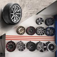 China Space-Saving Heavy Duty Steel Garage Wall Mount Tire Wheel Storage Rack for Warehouse for sale