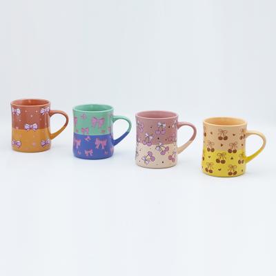 China 390 Ml Valentine's Day Two Color Glazed Coffee Mugs With Decal Fired For Souvenir Wholesale Shop for sale