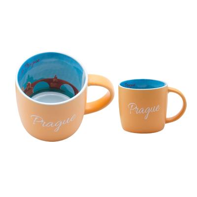 China Souvenir Two Tone Mug With Unique  Decal Fired Design 350ml Capacity For Souvenir Shop Collections for sale