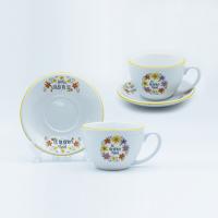 China White cup and saucer with decal fired, colored rim and handle line drawing for sale