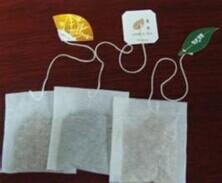 China 55*62.5mm food grade three side heat seal tea bag with string and tag for sale