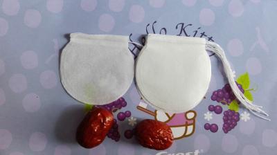 China 60mm round tea bag with string   food grade tea pods tea filter bags flower tea bag for sale