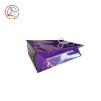 China Printed Paper Shopping Bags Glossy Laminated Type Thickness 0.5m for sale
