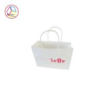 China Custom Recycled Paper Shopping Bags with Twisted Handle CMYK Printing 500pcs MOQ for sale