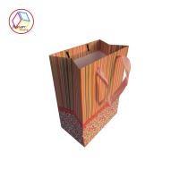 China Customized Foldable Kraft Paper Shopping Bags Large Size Eco Friendly with Logo for sale