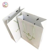 China Boutique White Printed Paper Bags Surface Technology Color Printing for sale