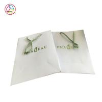 China Boutique White Printed Paper Bags Surface Technology Color Printing for sale
