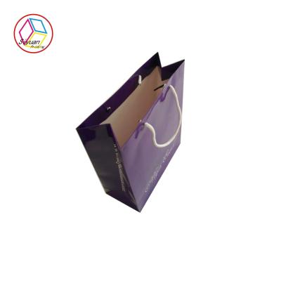 China Ivory Board Printed Paper Bags Varnish Surface With String for sale