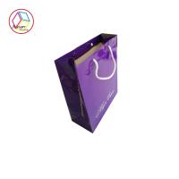 China Ivory Board Printed Paper Bags Varnish Surface With String for sale