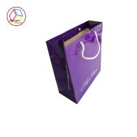 China Ivory Board Printed Paper Bags Varnish Surface With String for sale