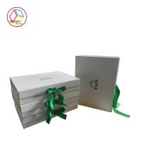 China Foldable White Box Green Logo Apparel Packaging Boxes With Ribbon for sale