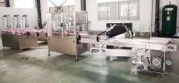China QGQ750 Automatic Aerosol Filling Machine High Efficiency 2400 - 3000 Cans / H for sale
