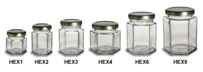 China 30ml-270ml clear glass jar for honey/hexagonal glass jars for sale