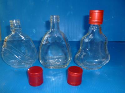 China clear glass bottle with screw cap/glass liquor bottle for sale