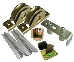 China Trapezoidal bracket pulley door rolling bearing iron door pulley and accessories for sale