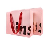 China Self Erecting Kraft Christmas Gift Bags Printed Branded Packaging Festival Gift Bags for sale