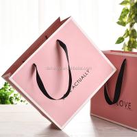 China OEM Kraft Paperboard Goodie Bags With Handles Retail Shopping Tote for sale