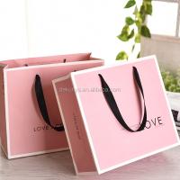 China OEM Kraft Paperboard Goodie Bags With Handles Retail Shopping Tote for sale