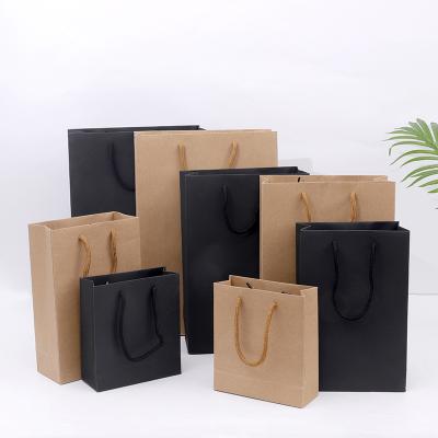 China Custom Kraft Paper Shopping Bags 10x12in with Flat Handles for sale