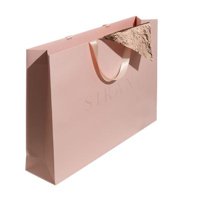 China Custom Luxury Pink Coated Paper Gift Bag 12x8x4 Inches with Handles for sale