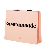 China Custom Luxury Pink Coated Paper Gift Bag 12x8x4 Inches with Handles for sale
