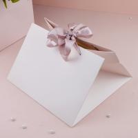 China Custom Luxury Fold Pattern Kraft Paper Bag 12x8in for Clothing Gifts for sale