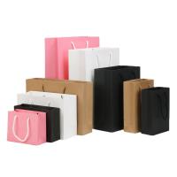 China Custom Luxury Fold Pattern Kraft Paper Bag 12x8in for Clothing Gifts for sale