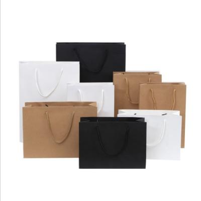 China Custom Biodegradable Kraft Paper Shopping Bag 12x8in with Drawstring for sale