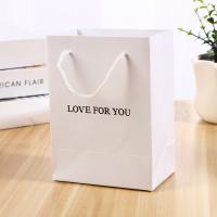 China Custom Recycled Art Paper Gift Bags 12x8x4in with Logo Printing for sale