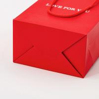 China Custom Recycled Art Paper Gift Bags 12x8x4in with Logo Printing for sale