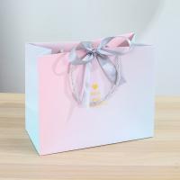 China Recycled Ivory Board Paper Shopping Bags 12x8x4in with Luxury Ribbon Rope for sale