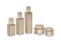China Family Set Square Gold Cosmetic Packaging Bottles 30/60/120ml For Skincare for sale