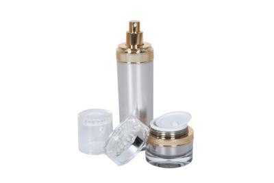 China Cylinder Acrylic Lotion Essence Bottle 50ml Round Face Cream Jar Cosmetic Packaging Set for sale