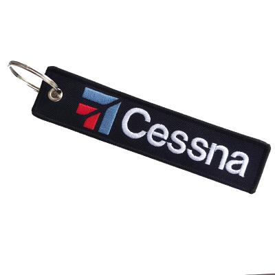 China Cessna Letters Fashion Trinket Double Sided Embroidery Metal Keychain Airline gift crew use key chains for sale