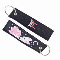 China Embroidered Fashion Design Fabric Embroidery Jet Tag Custom Keychains Woven Double-side Keychain for sale