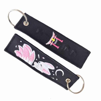 China Embroidered Fashion Design Fabric Embroidery Jet Tag Custom Keychains Woven Double-side Keychain for sale