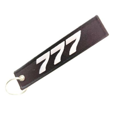 China Embroidered Flight Keychains Custom Embroidery Keychain Woven Key jet Tag Fabric Car Keychain for sale