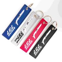 China Custom Promotional Logo Blank Cute Anime 3D 2 Sided Woven Fabric Embroidery Key Jet Tag Keychain for sale