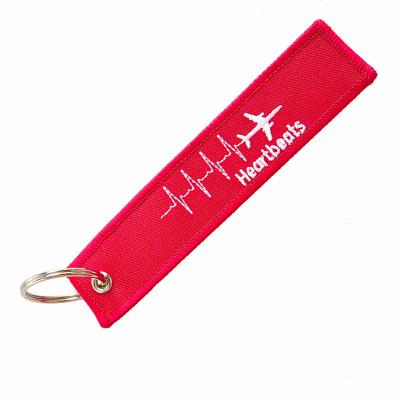 China Heartbeat Plane Keychain - Custom Embroidery on Durable Polyester / Metal Ring & Premium Packaging for sale