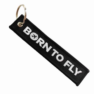 China Travel Gift Keychain - Anti-Fade BORN TO FLY Embroidery / Waterproof Polyester & Custom Packaging for sale