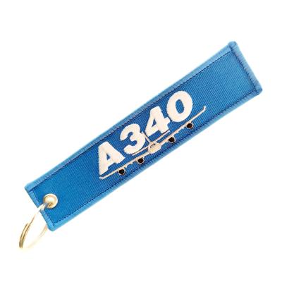 China Vintage A340 Keychain – Blue Fabric Silhouette + Anti-Rust Metal Ring for Pilots for sale