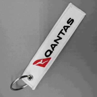 China Polyester Zinc Alloy Custom Embroidered Keychain Elegant Aviation Tag Keychain for sale