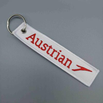 China Symmetrical Flight Tag Keyring Double Stitch Pure White Aesthetic For Aviation Collector for sale