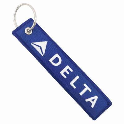 China Blue White Custom Embroidered Keychain Co-Branded Gift DELTA Airlines Custom Embroidered Keyring for sale