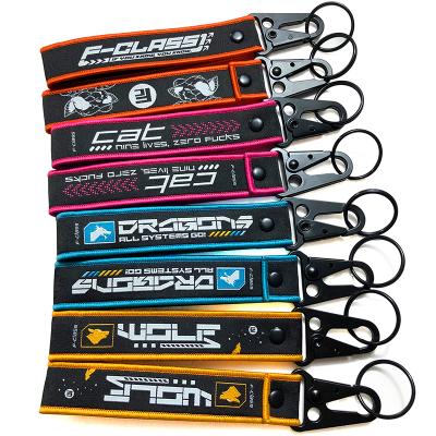 China Design logo Embroidered Keychain Custom Fabric Key Chain Keyring Tags Embroidery Keychain for sale