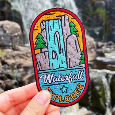 China Custom Cutout Shape Embroidery Patches with Iron-On Backing and Full Woven Design for sale